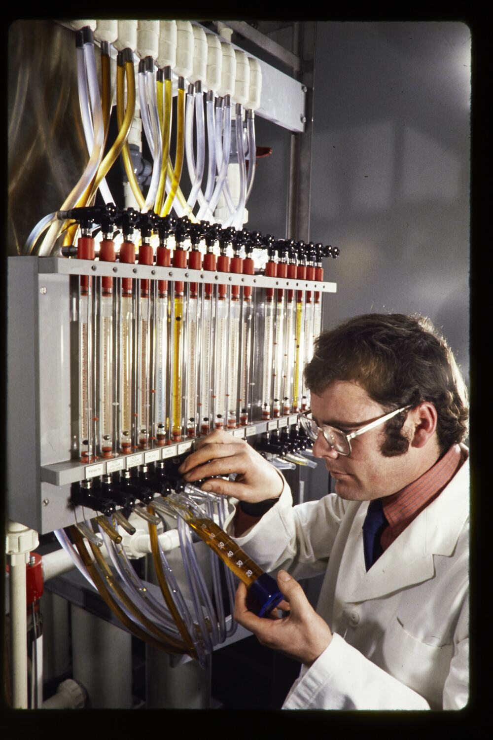 Slide - Kodak Australasia Pty Ltd, Decanting Chemical from a Processing ...
