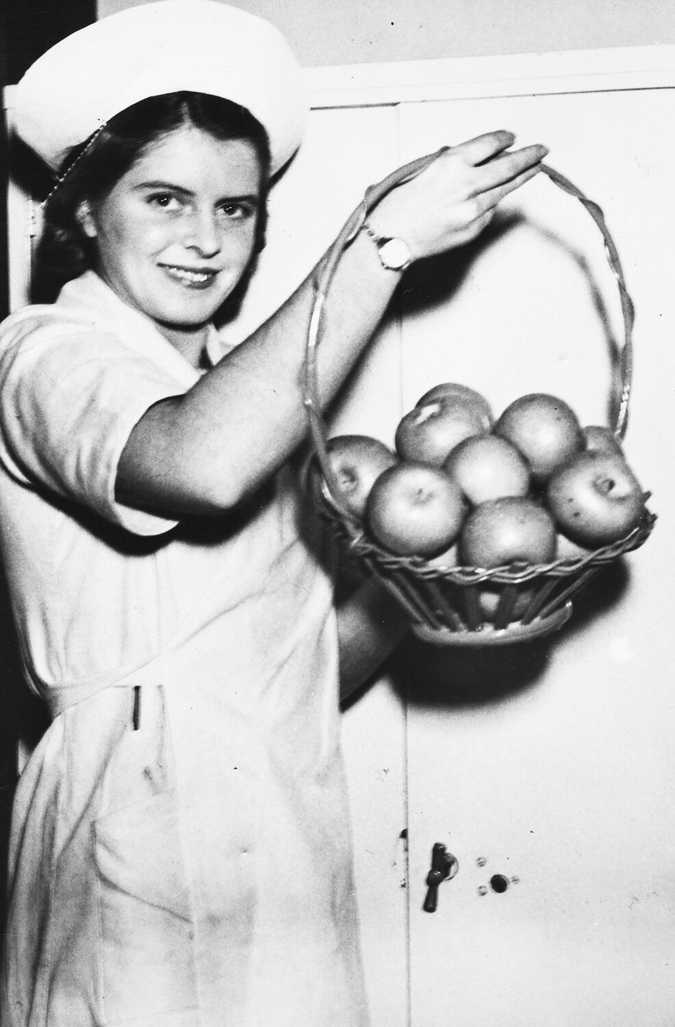 Negative - Emily McPherson College, Woman with Apples, 1927-1960