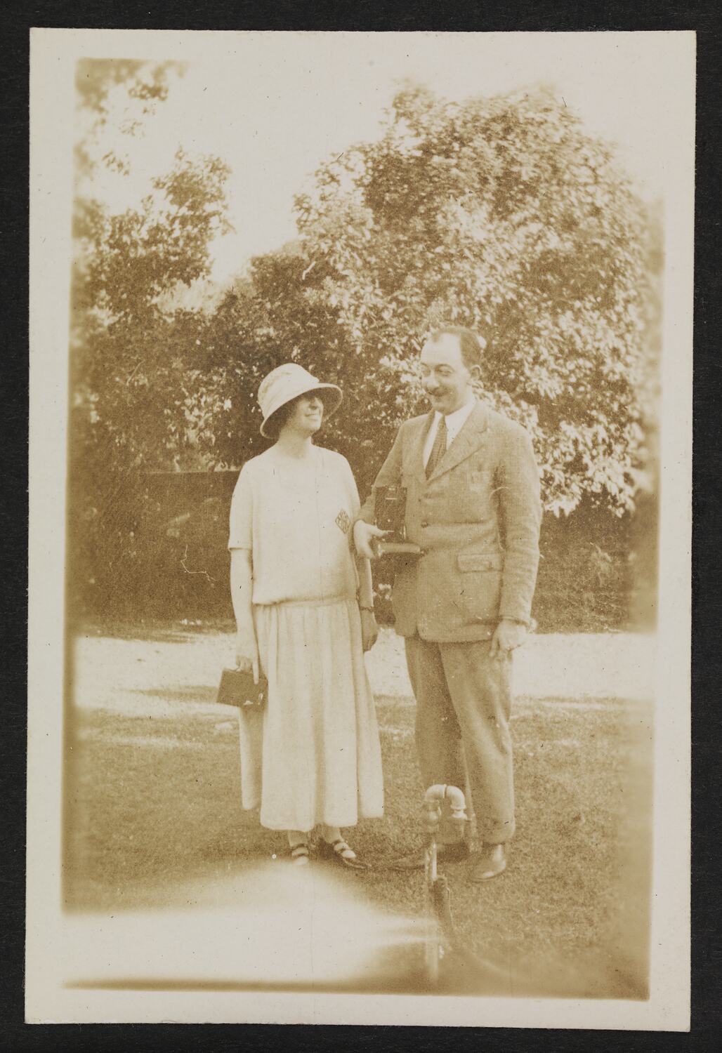 Digital Image - Edgar & Mary Rouse on Lawn With Cameras, circa 1920s