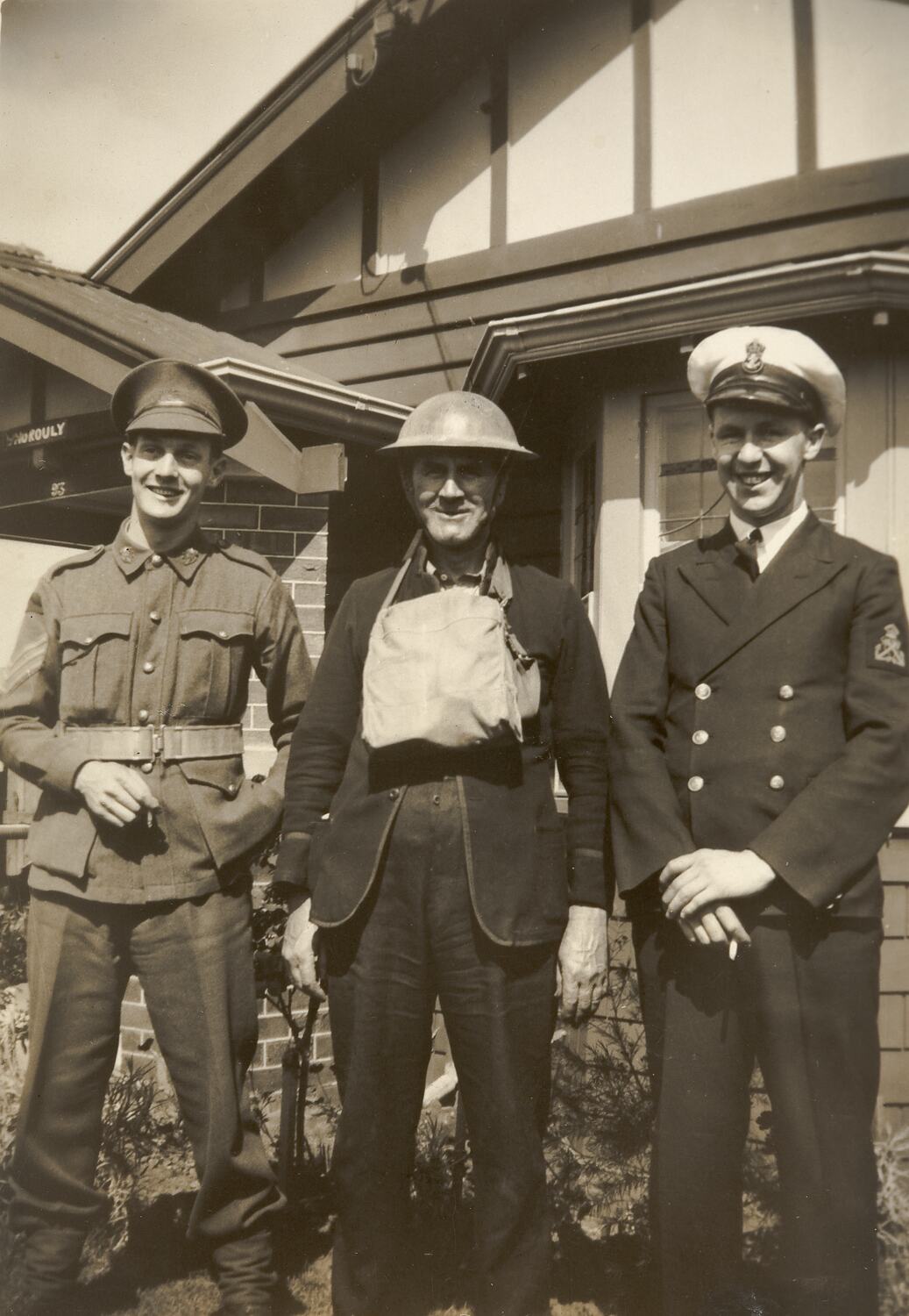 Digital Photograph - Three Men in Uniforms in Front of House during ...