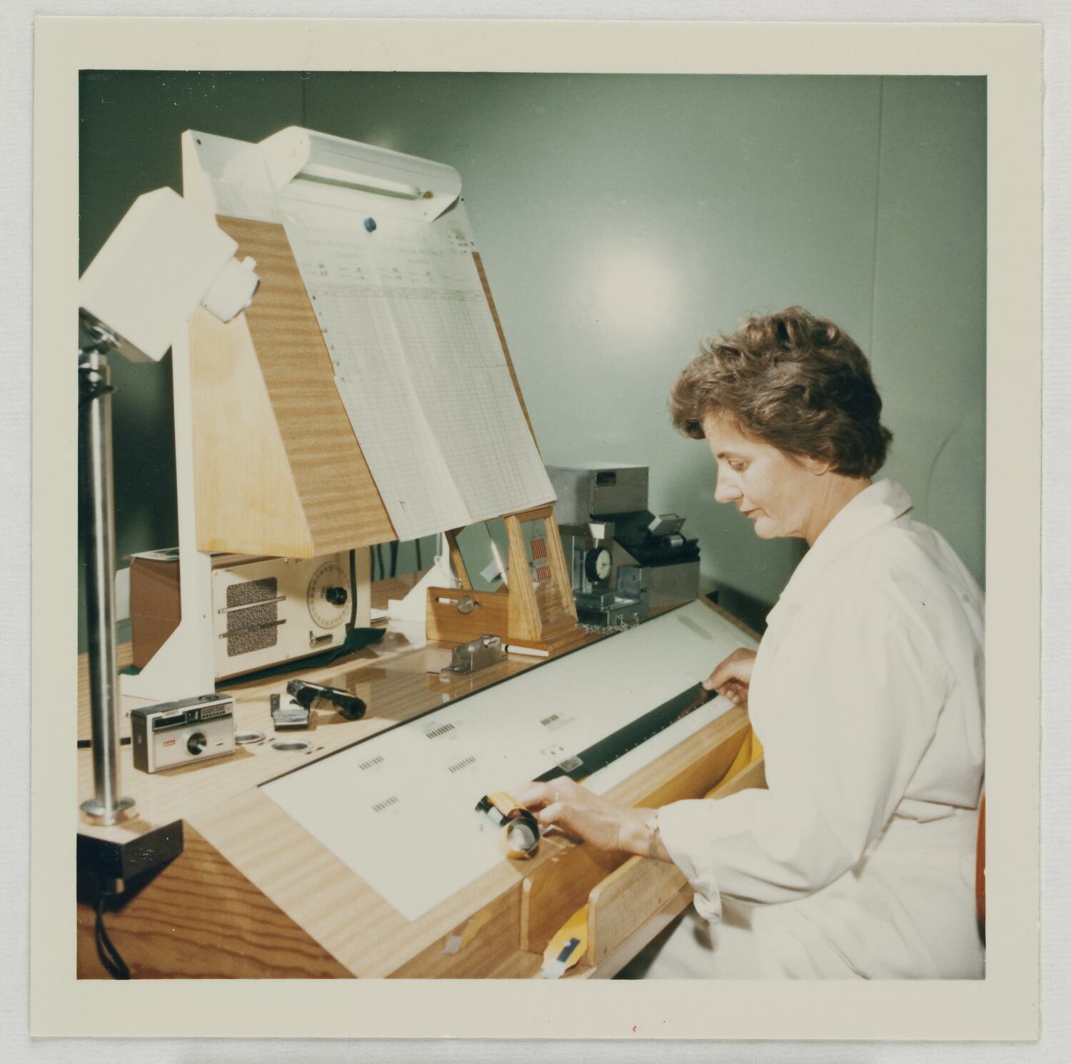 Photograph - Worker Checking 126 Film, Kodak Factory, Coburg, circa 1960s