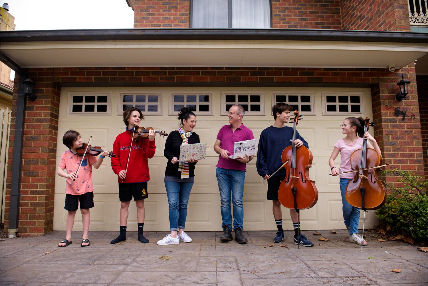 Digital Photograph - Family Standing in Their Front Yard with Musical ...
