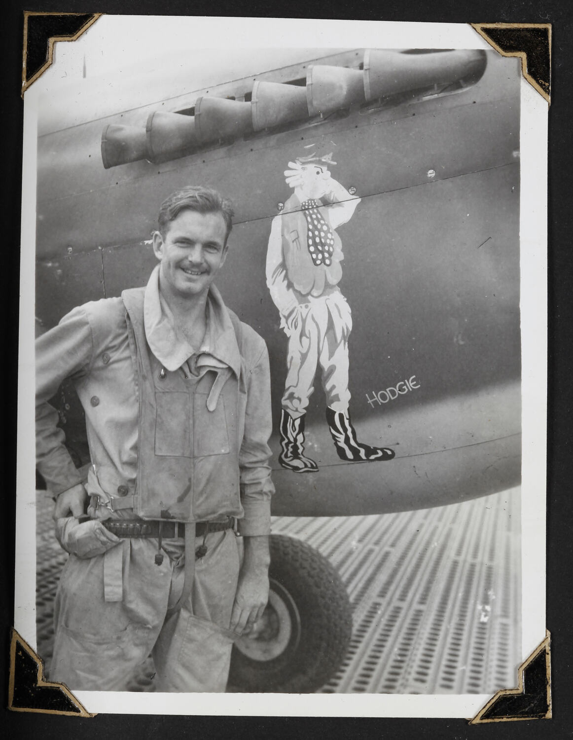 Photograph - 'F/O J.A.T Hodgkinson & Aircraft Mascot', New Guinea, 1942 ...
