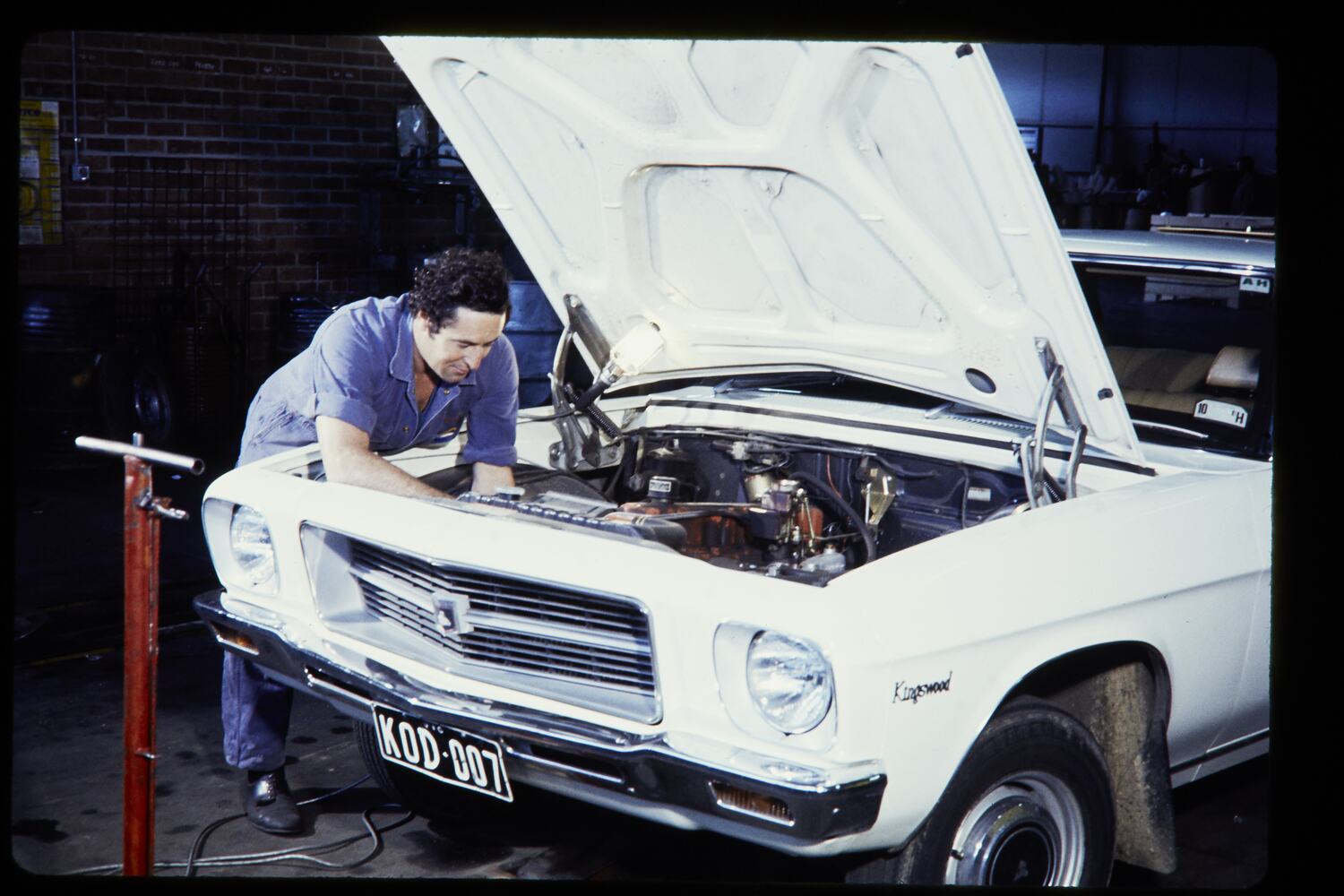 Slide - Kodak Australasia Pty Ltd, Mechanic Working on a Motor Car ...