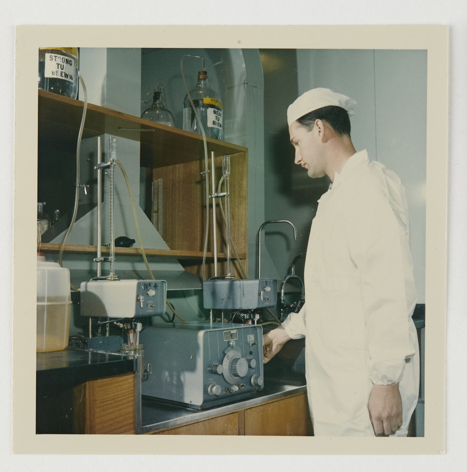 Photograph - Worker Checking Solution, Kodak Factory, Coburg, circa 1960s