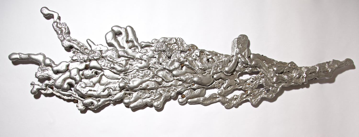Digital Photograph - Pool of Melted Alloy from Aluminium Ladder ...