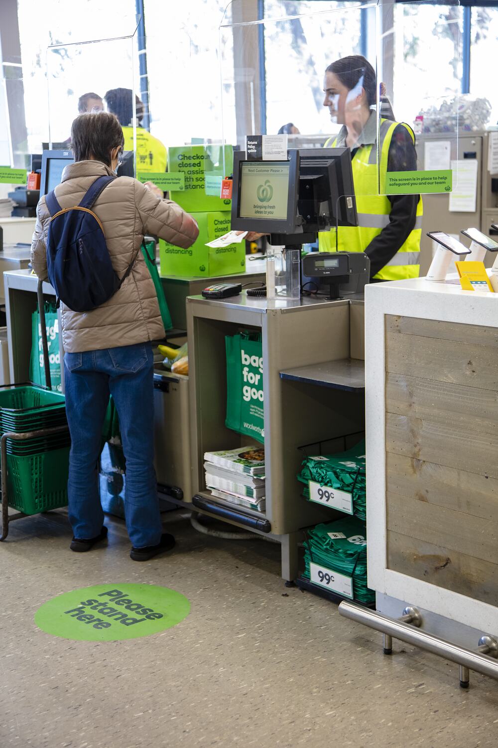 Digital Photograph - Customer and Cashier Behind Sneeze Screen at ...
