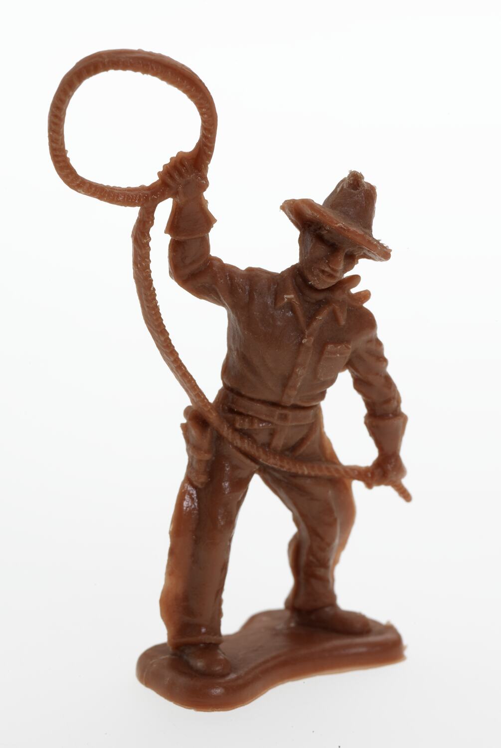 Toy Cowboy - Holding Lasso, Brown Plastic, circa 1950s