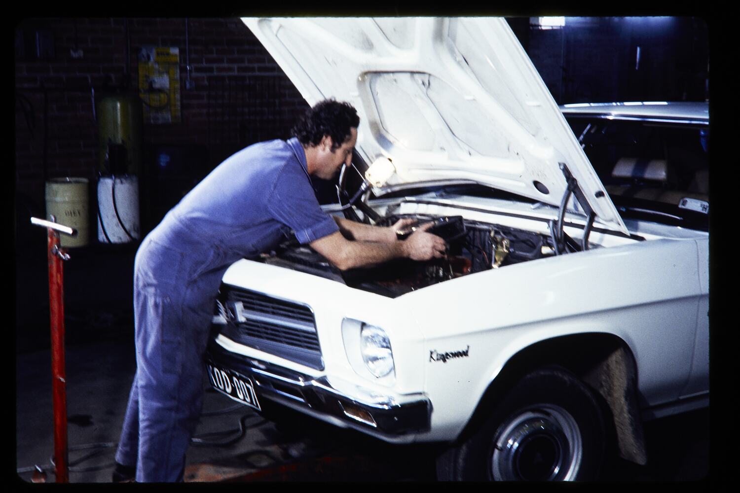 Slide - Kodak Australasia Pty Ltd, Mechanic Working on a Motor Car ...
