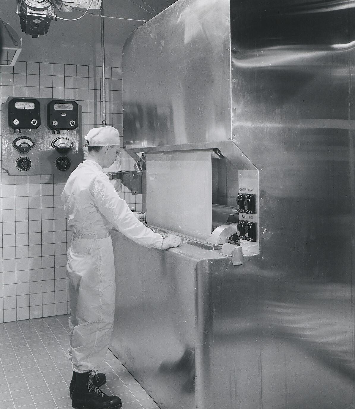 Photograph - Kodak, Worker Monitoring Film Base Receiving a Coating of ...
