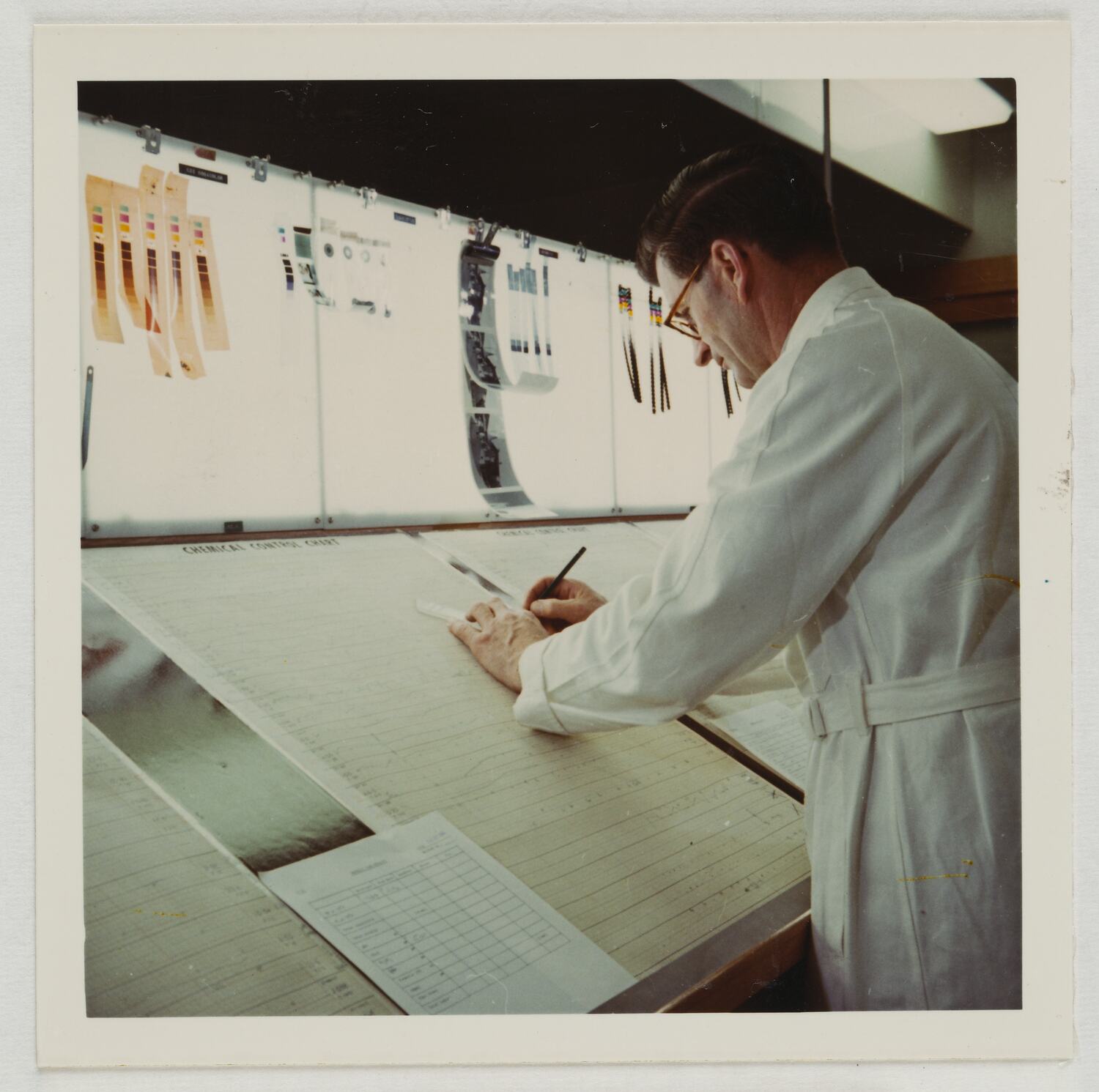 Photograph - Technician Analysing Sensitometric Readings, Kodak Factory ...
